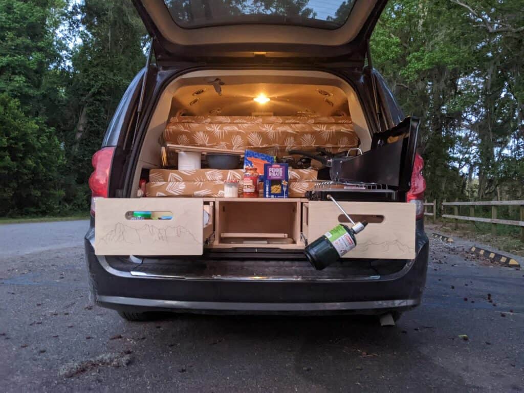 Dodge Grand Caravan with lightweight camper conversion kit - Vanlife Trader