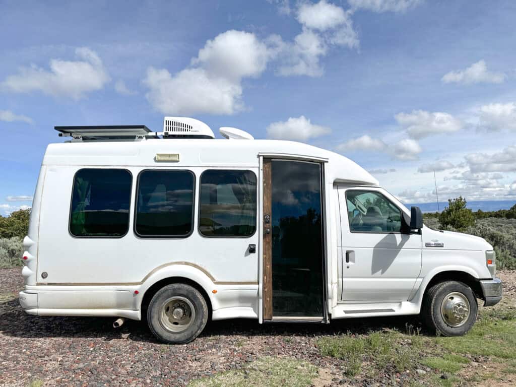 2008 Ford E-350 Shuttle Bus Camper with Passenger Seat - Vanlife Trader