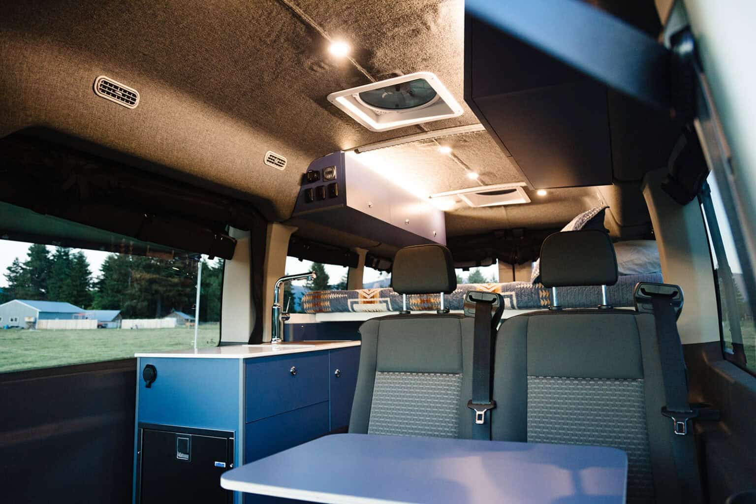 2023 New Build | 2020 Ford Transit 2WD Seat & Sleep 4 - Vanlife Trader