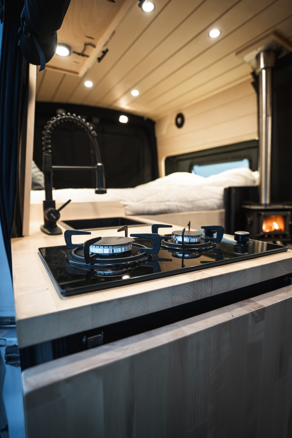 Ford Transit Luxury Class B Camper van with Wood Stove - Vanlife Trader