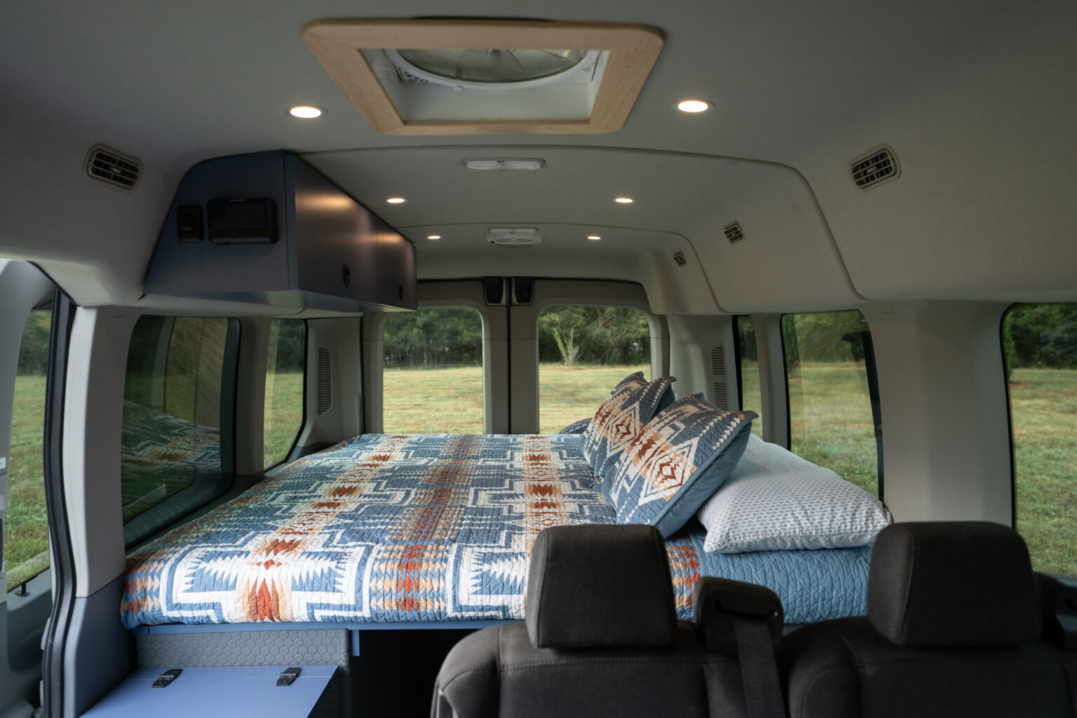 Luxury Minimalist Camper Van by Wolf Wagons | Low Milage - Vanlife Trader
